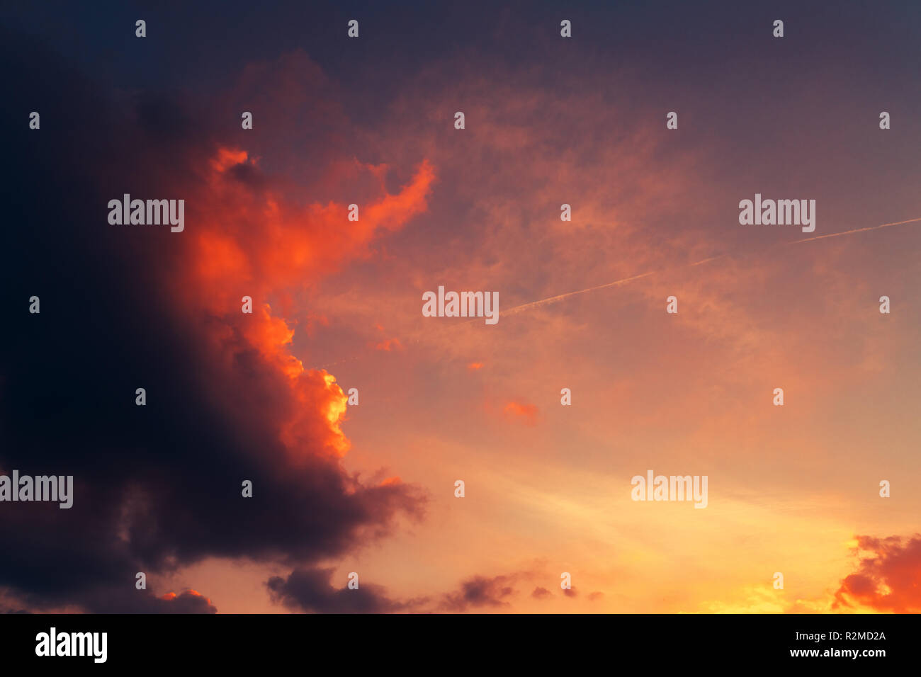 Purple autumn sunset sky with clouds as background Stock Photo - Alamy