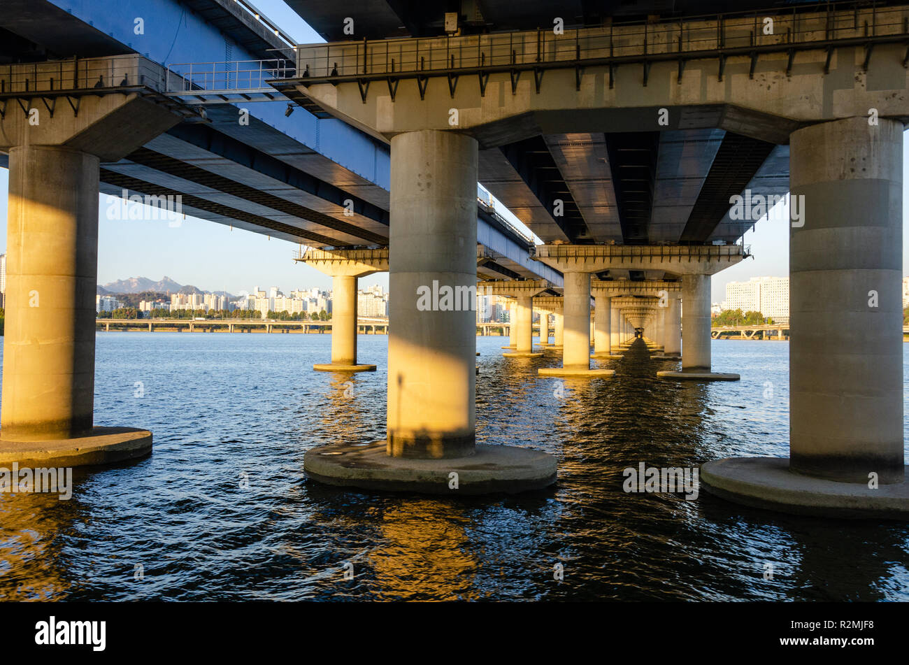 Passing underneath The Mapo Bridge which spans The River Han at Seoul ...