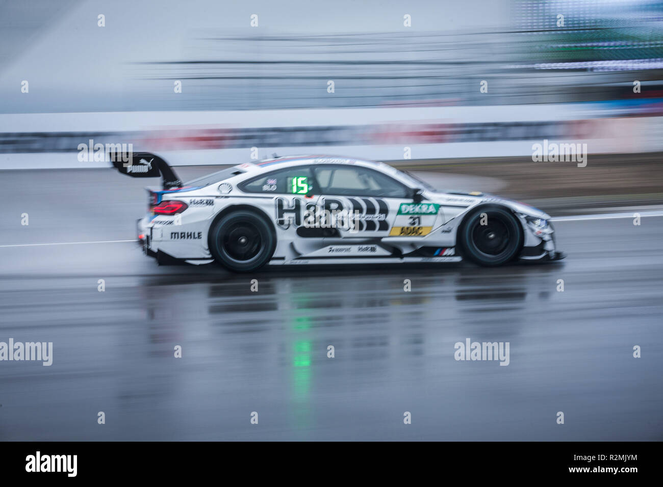 DTM racing car on wet race track, BMW M4 DTM Stock Photo - Alamy