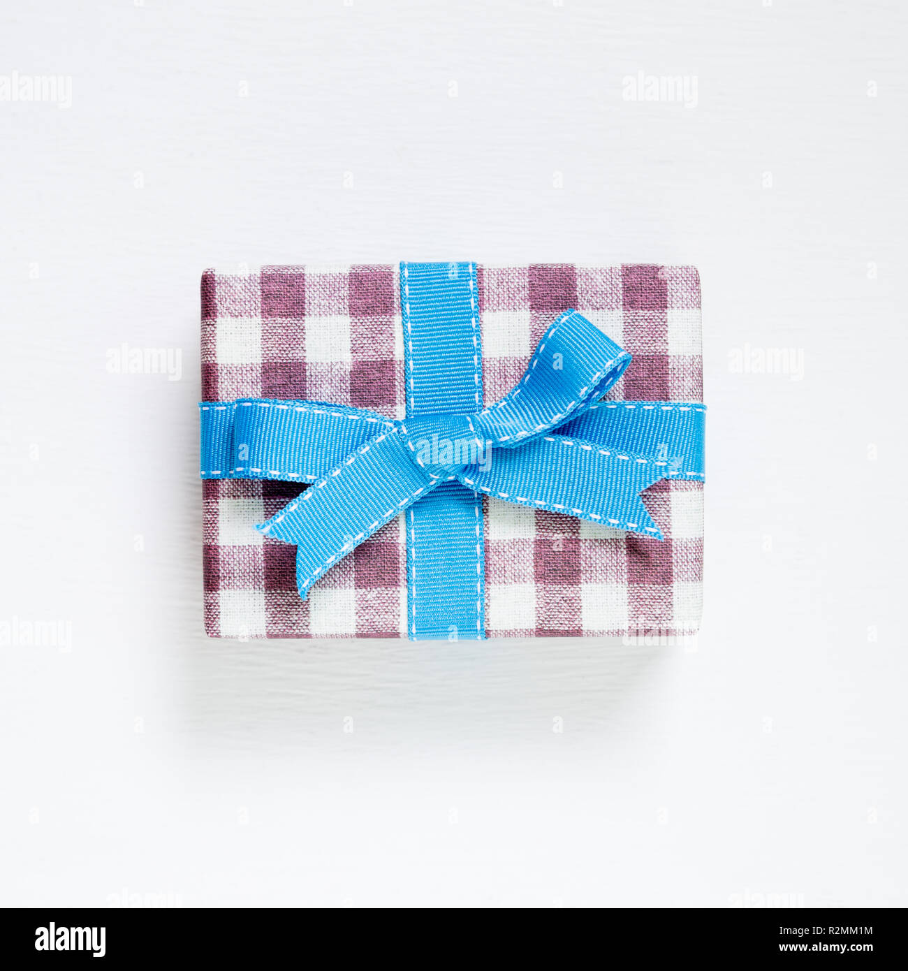 Check pattern gift box isolated on white background Stock Photo - Alamy