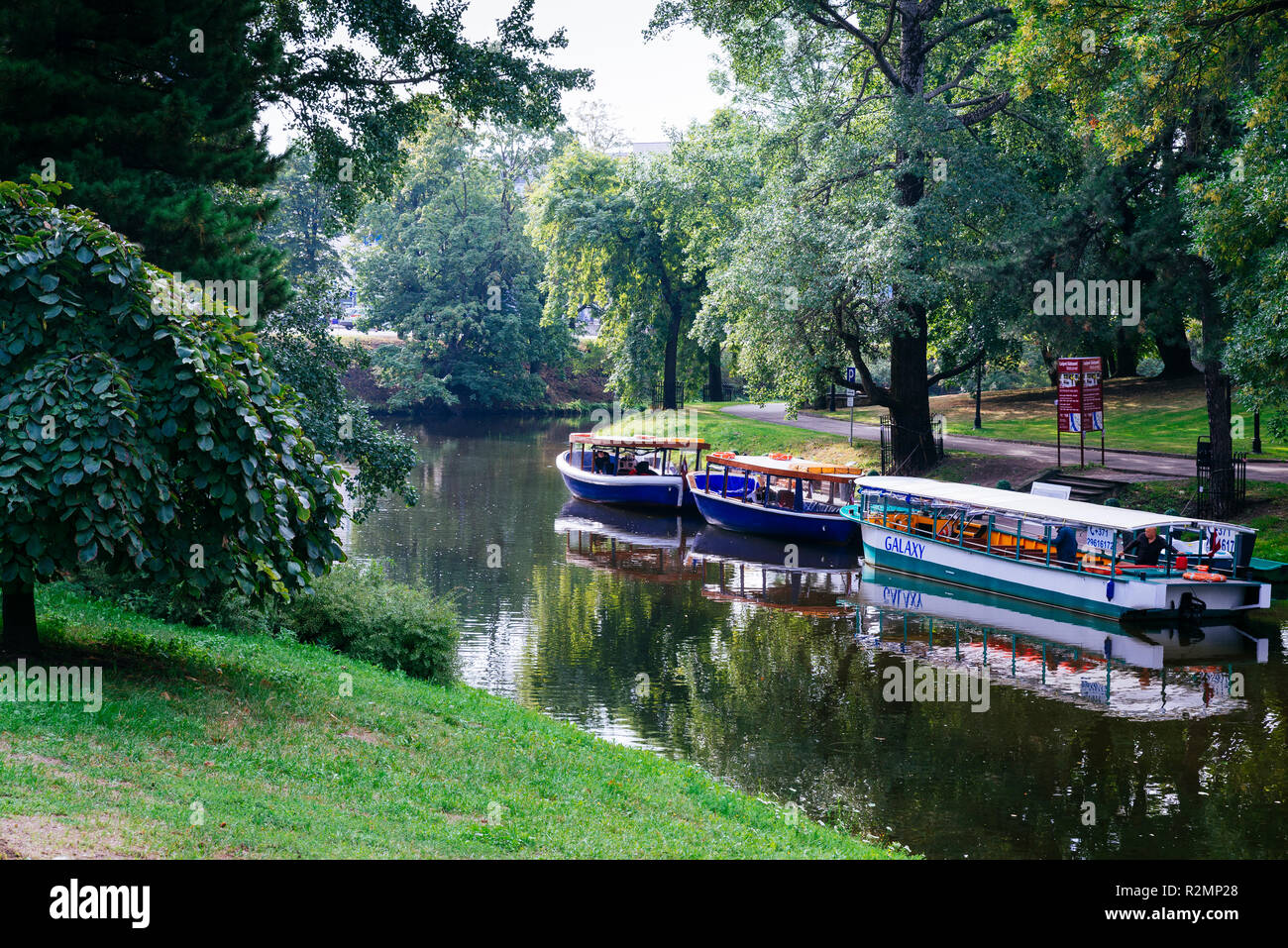 Riga canal, pleasure boats in Bastion Hill Park, Bastejkalns, in the ...