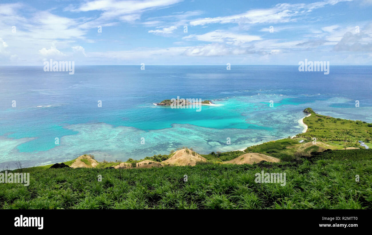 View of Nacula Island, coral reefs, turquoise waters, Fiji Stock Photo ...
