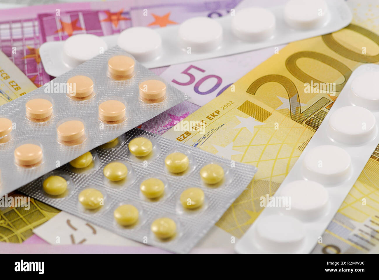 Euro bank notes and tablets hi-res stock photography and images - Alamy