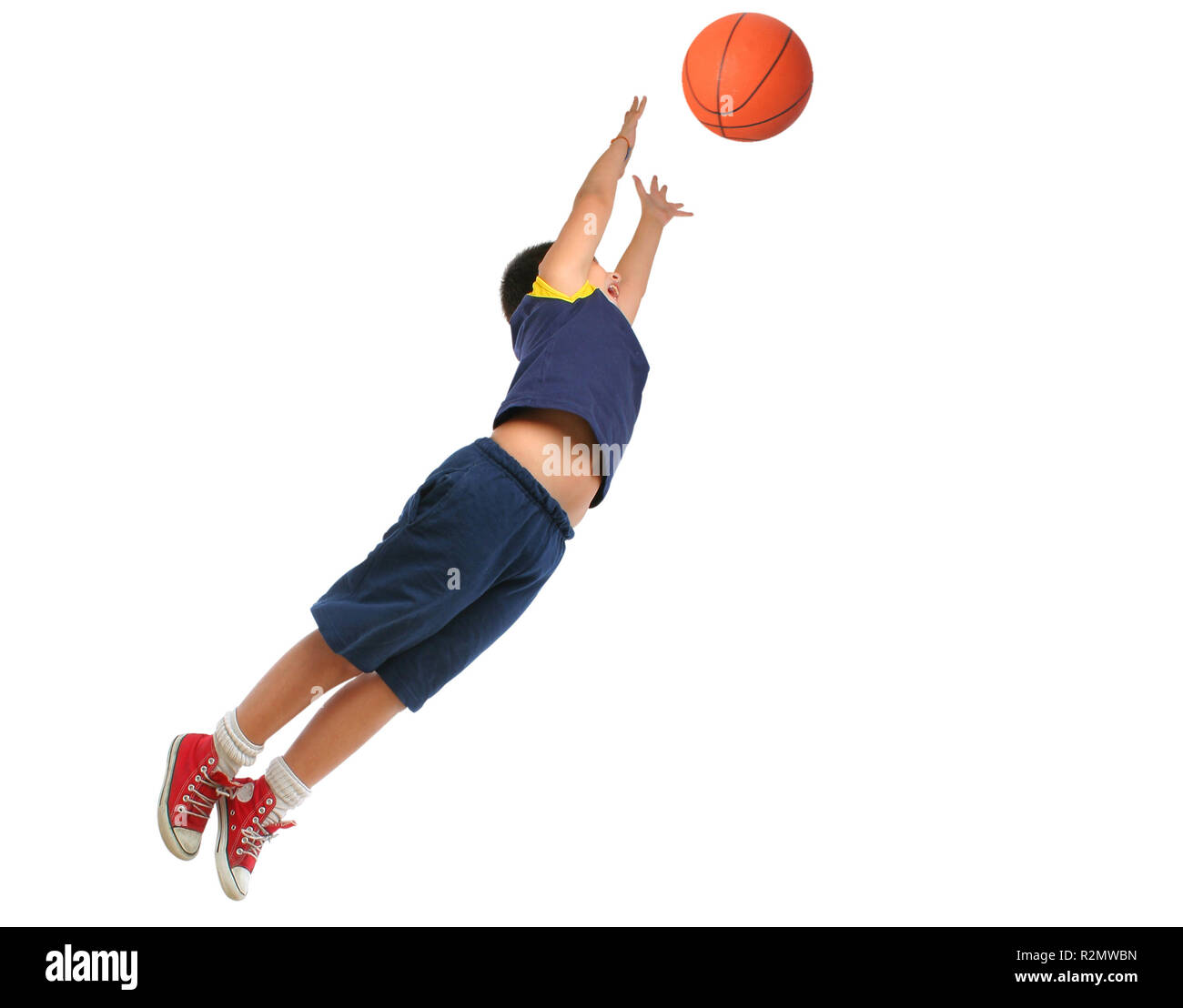 Children bouncing basketball hi-res stock photography and images - Alamy