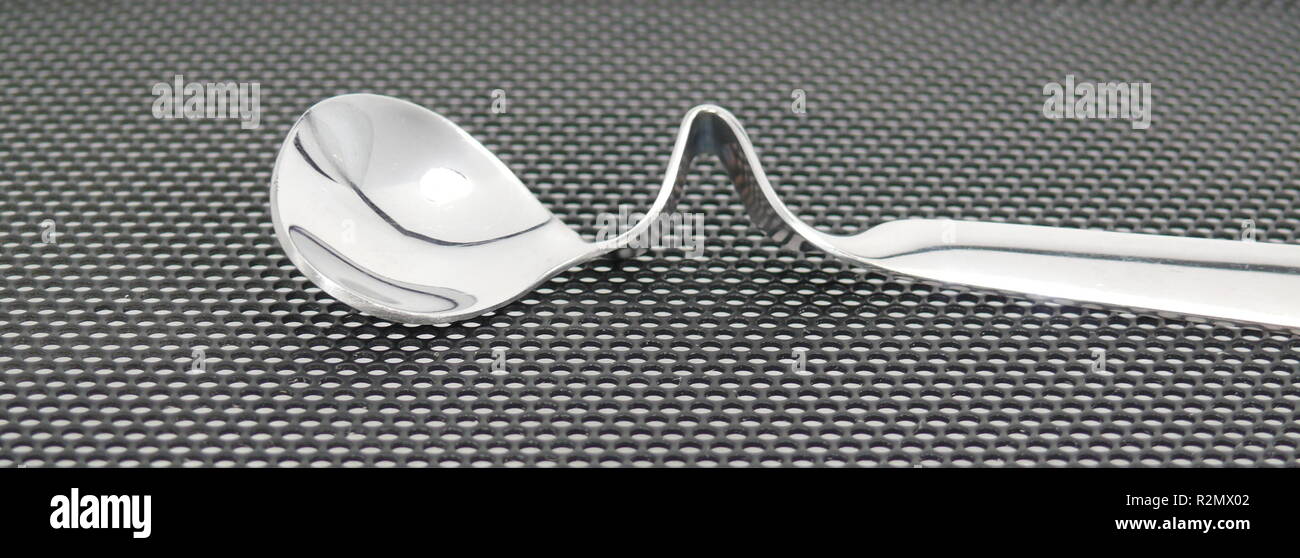 Uri geller spoon hi-res stock photography and images - Alamy