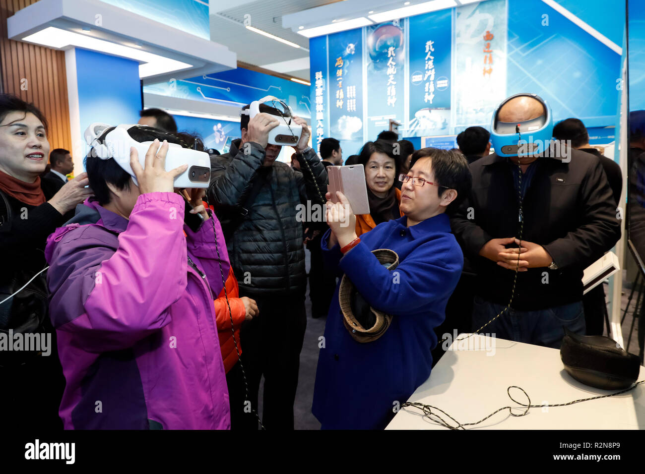 Beijing, China. 20th Nov, 2018. Visitors experience a virtual reality ...