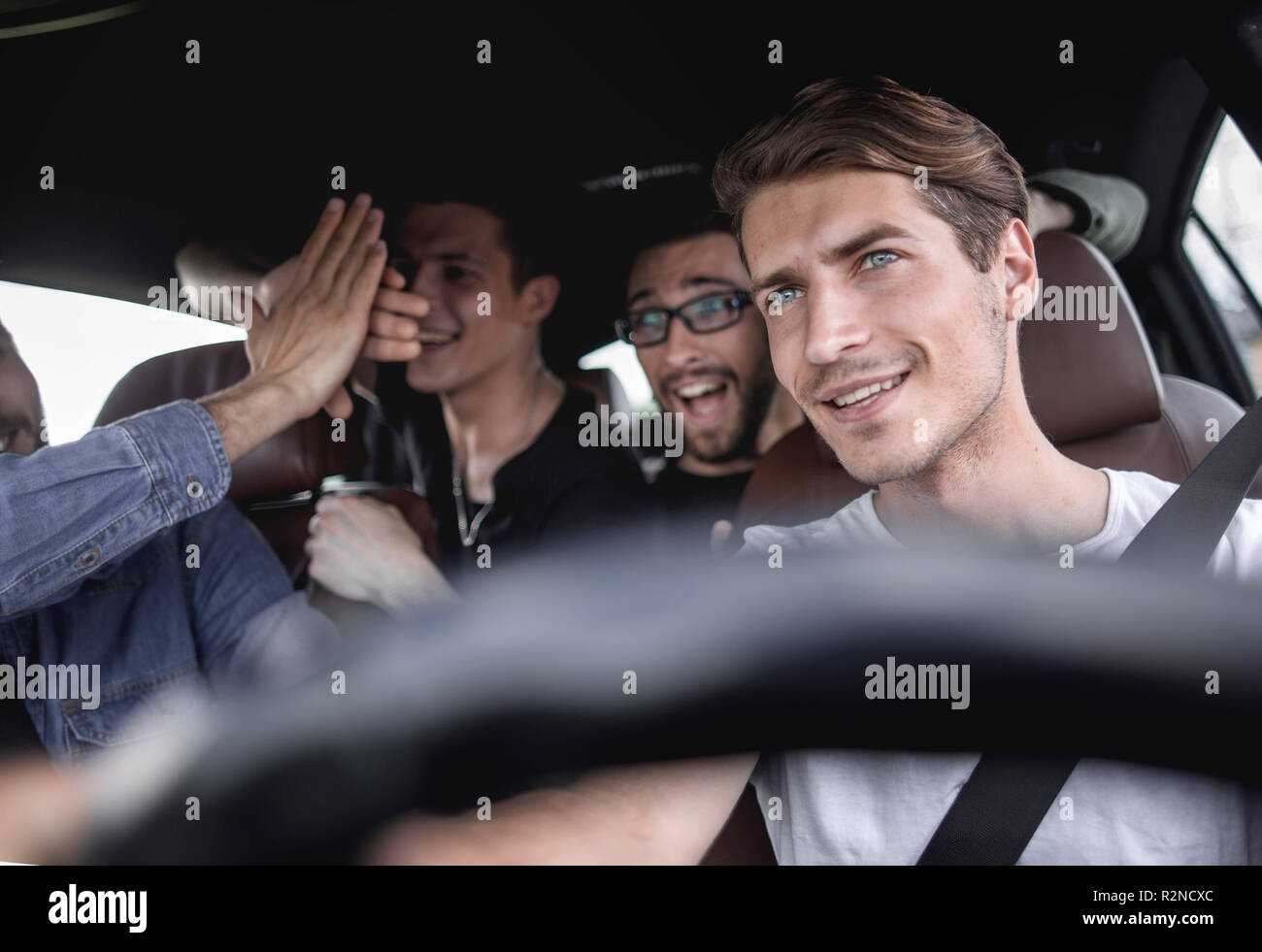 A group of people inside a car, on a road trip Stock Photo - Alamy