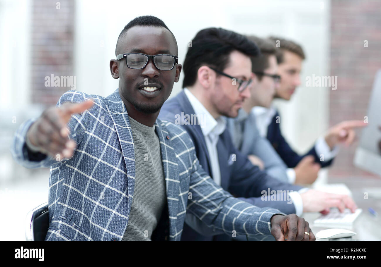 young businessman reaching out for a handshake Stock Photo - Alamy