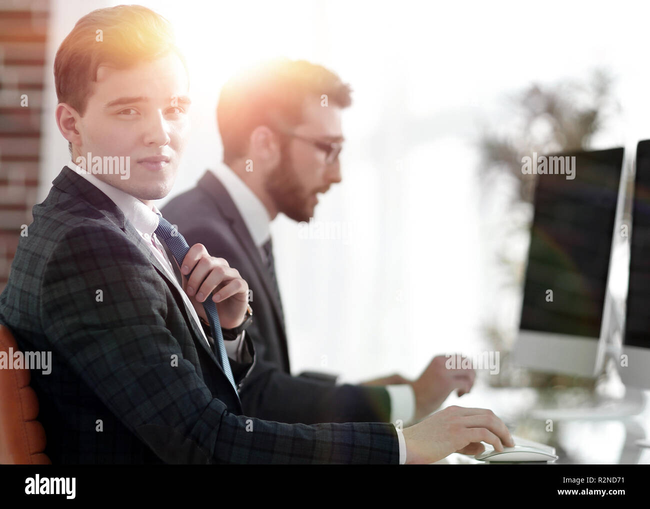employees work with computers in a modern office Stock Photo - Alamy
