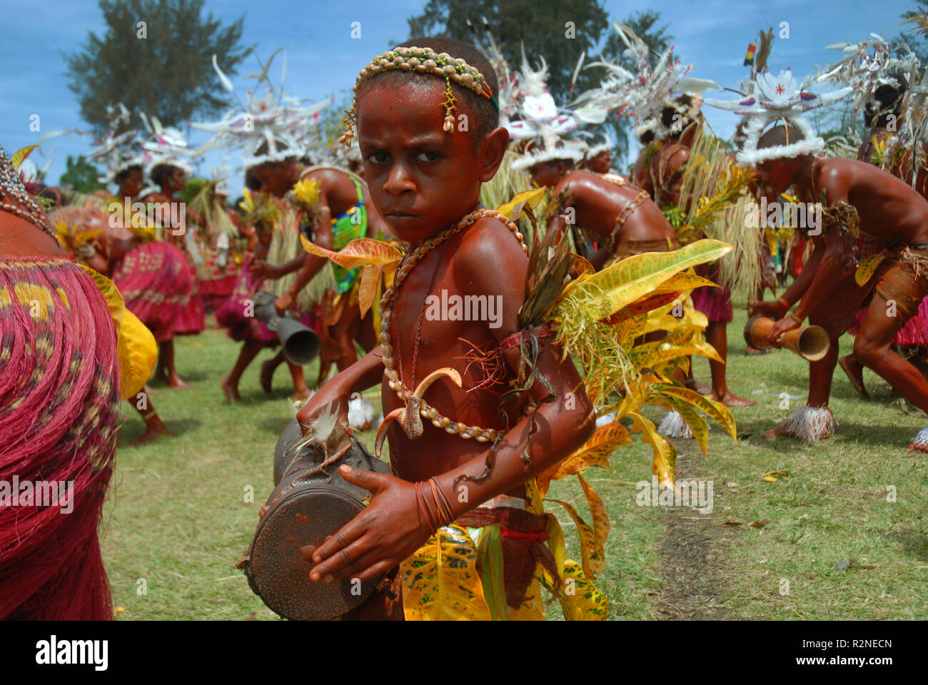 Dancers performing a traditional dance as part of a Sing Sing in Madang ...