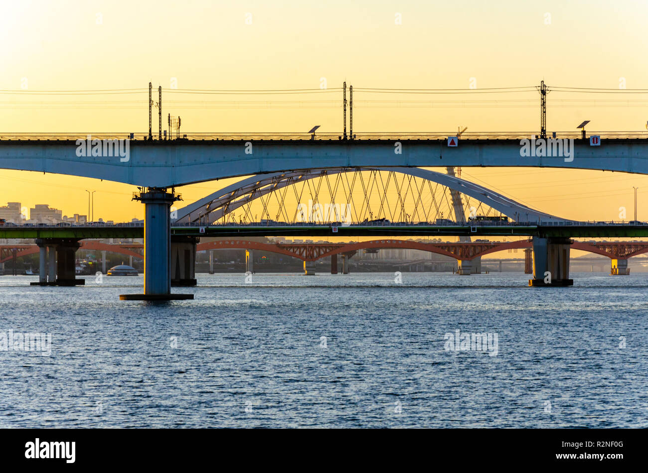 Road and rail bridges spanning the Han River at Seoul in South Korea ...