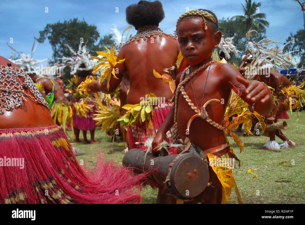 Dancers performing a traditional dance as part of a Sing Sing in Madang ...