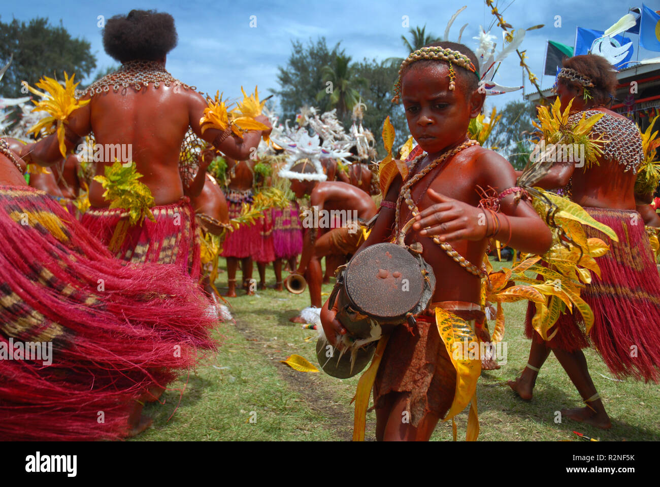Dancers performing a traditional dance as part of a Sing Sing in Madang ...