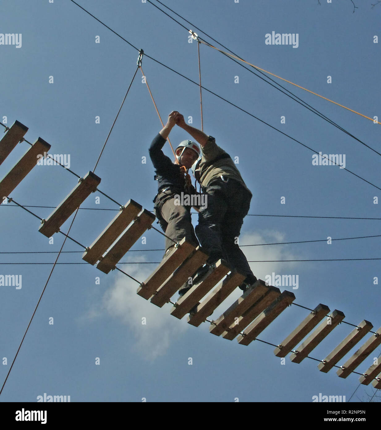 balancing on the jungle bridge Stock Photo - Alamy