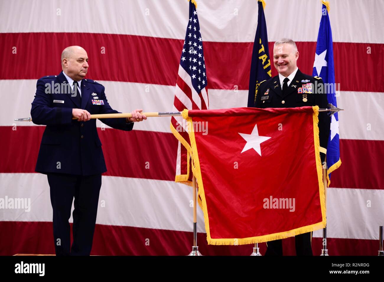 Oregon Army National Guard Brig. Gen. Gregory T. Day (right) receives a ...