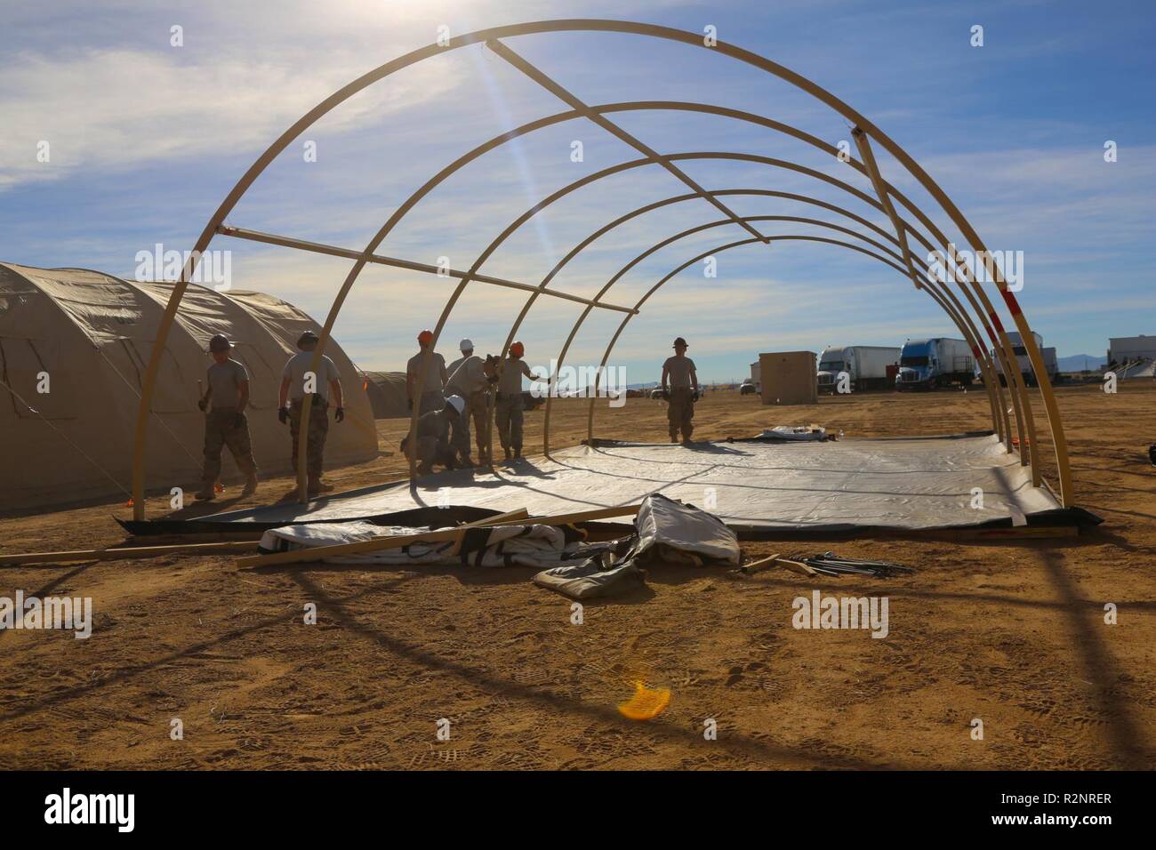 U.S. Soldiers and Airmen of 355 Civil Engineer Squadron construct the ...