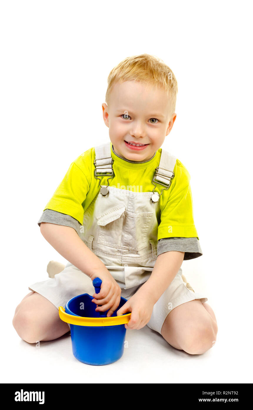playing boy isolated on a white background Stock Photo - Alamy