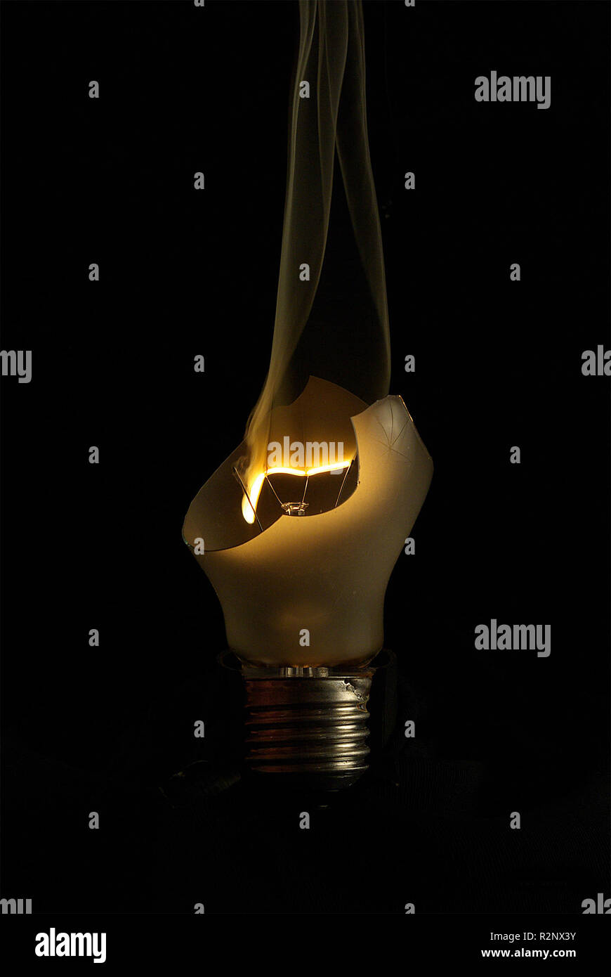 burning light bulb Stock Photo - Alamy