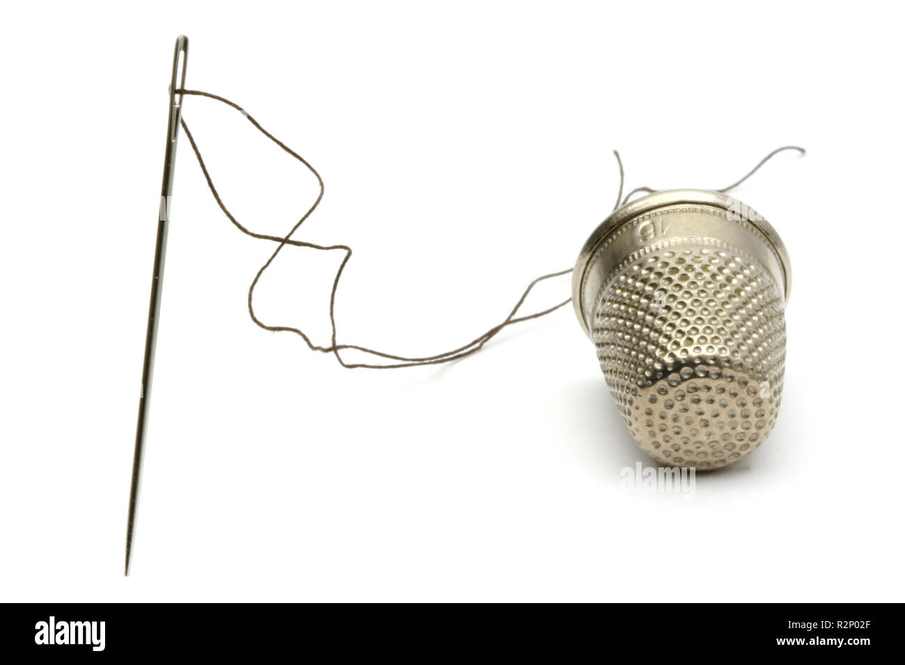 needle and thread Stock Photo - Alamy