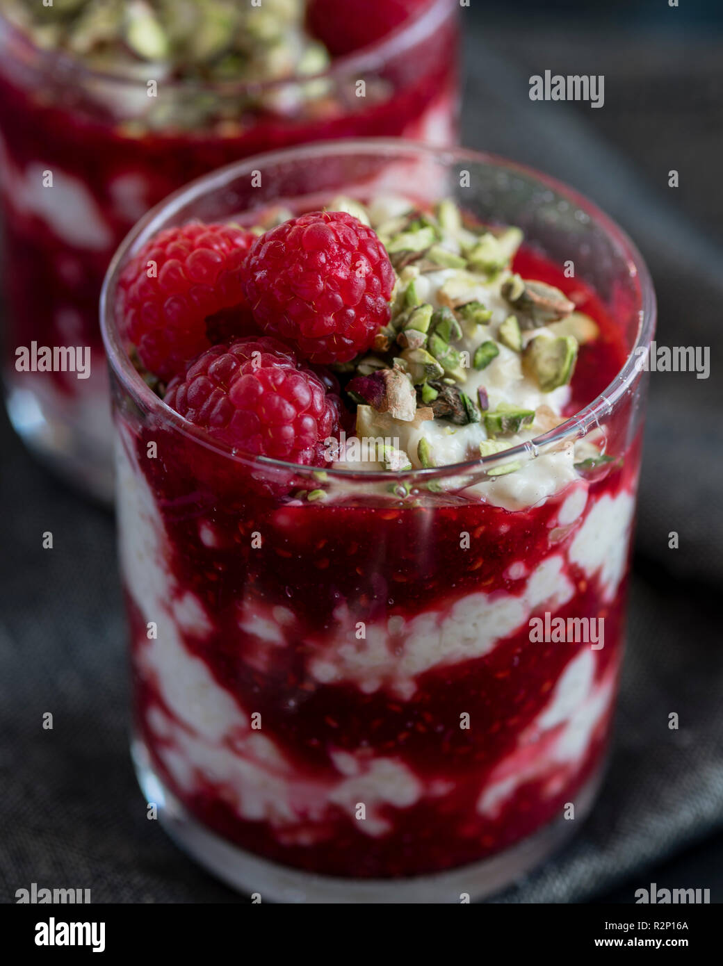 close up of layered porridge with raspberry Stock Photo - Alamy
