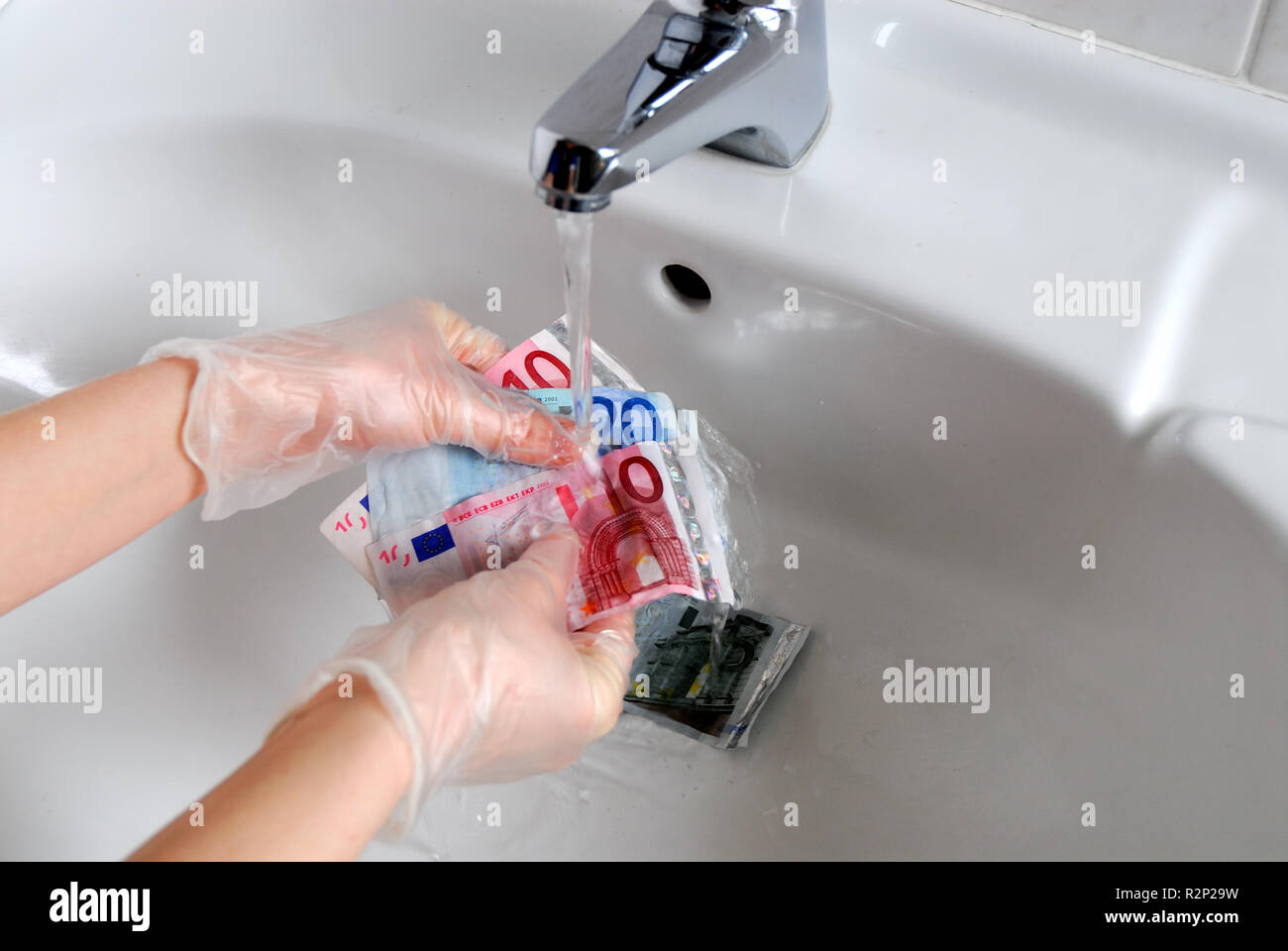 Laundering hi-res stock photography and images - Alamy