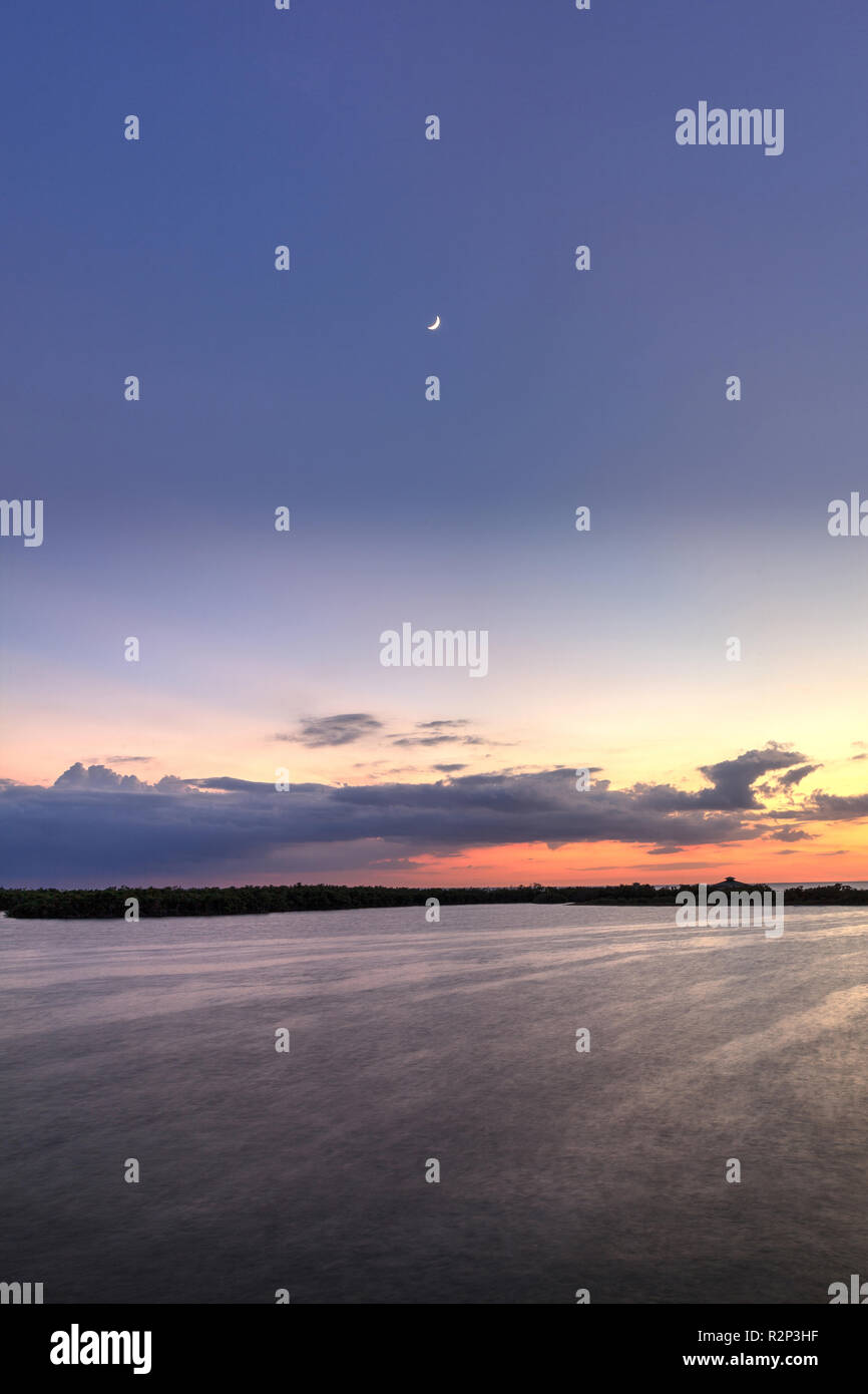 Crescent moon over New Pass from Estero Bay Sunset in Bonita Springs ...
