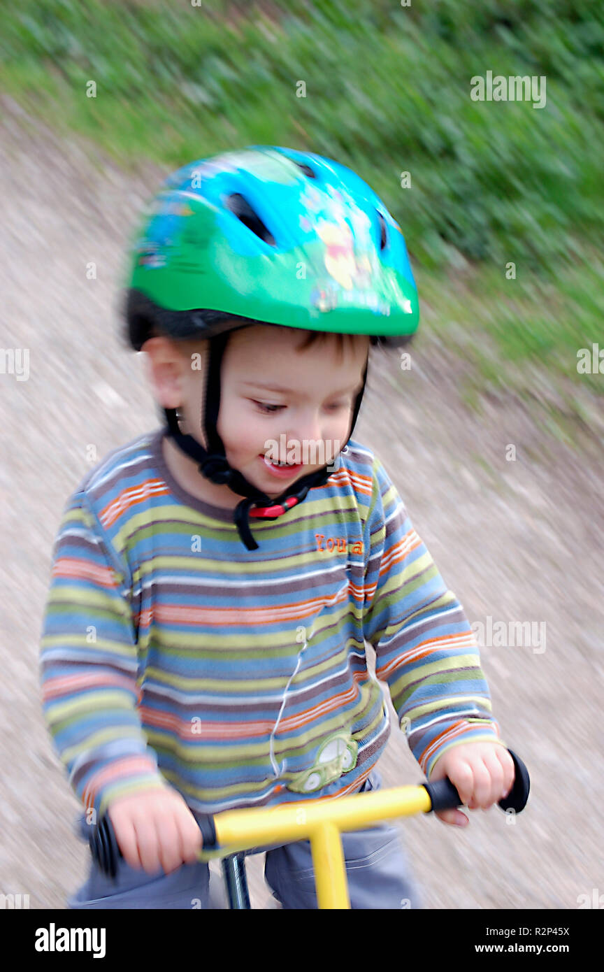 boy on wheel Stock Photo - Alamy