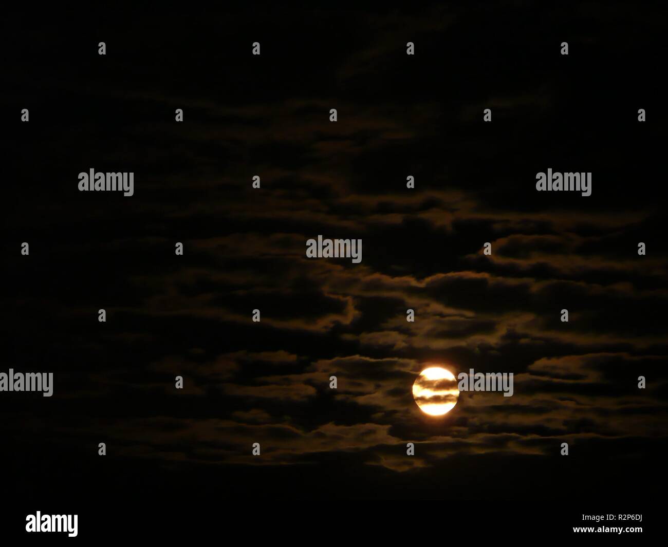 Clouded moon hi-res stock photography and images - Alamy