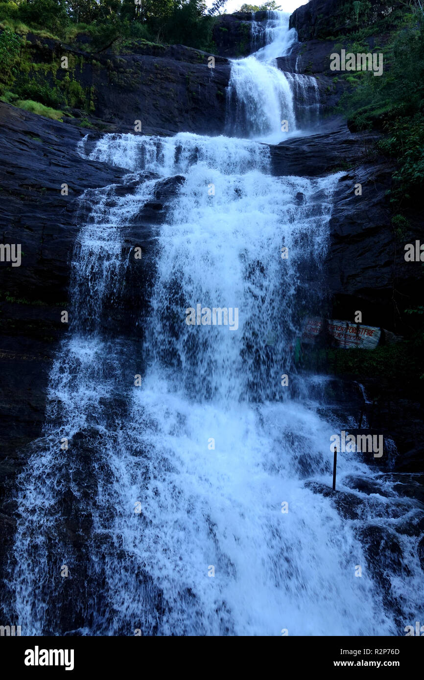 flowing waterfall from the mountains Stock Photo - Alamy