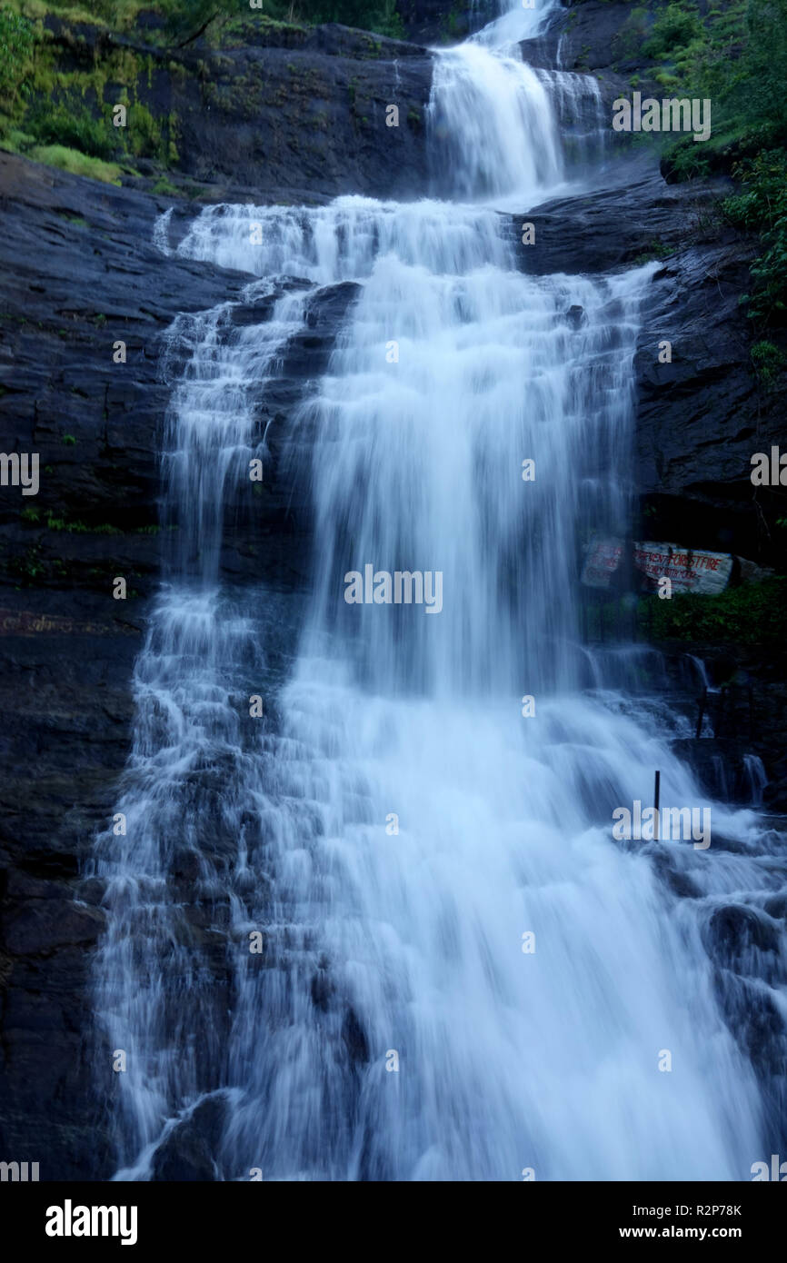 flowing waterfall from the mountains Stock Photo - Alamy
