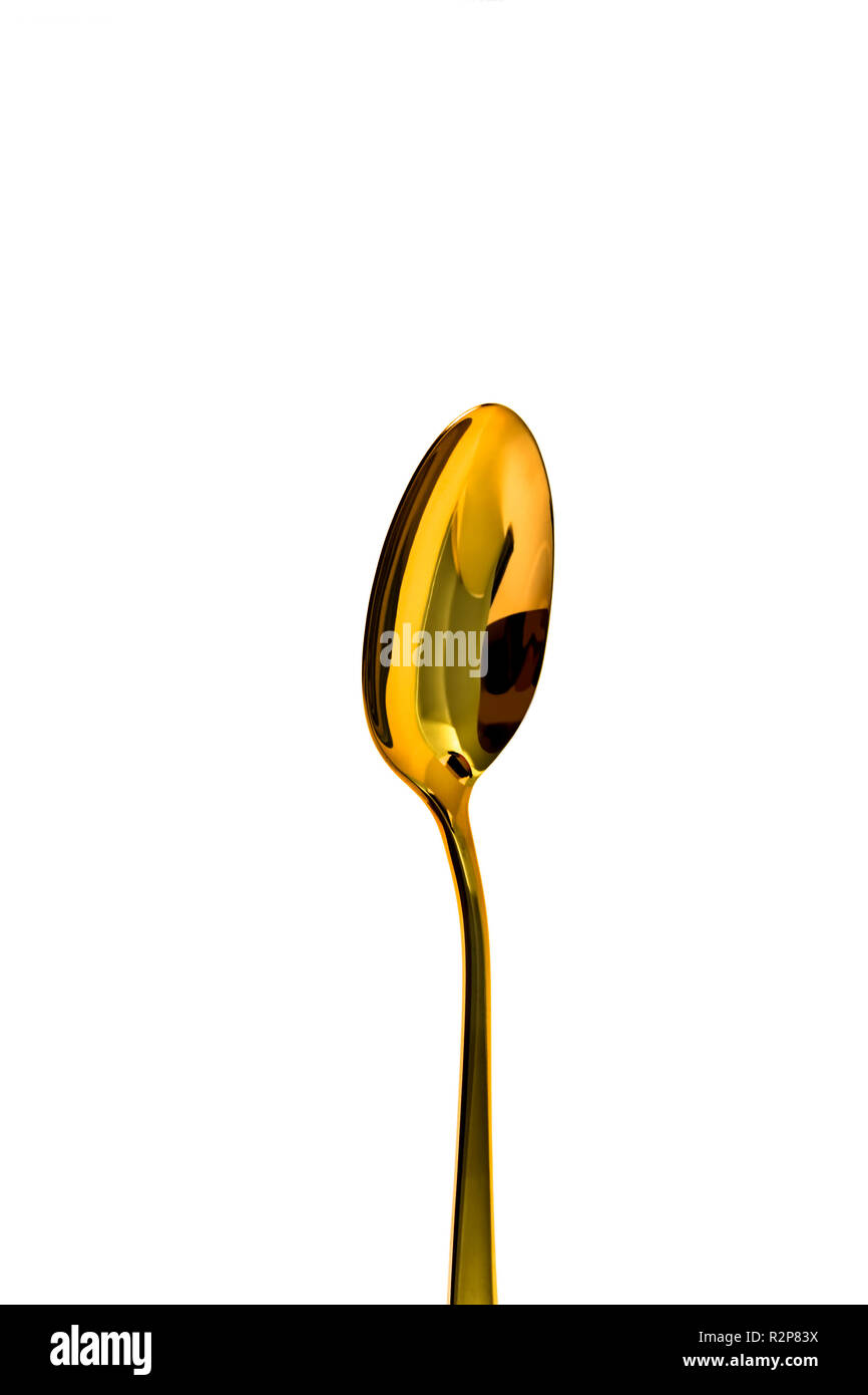 Cutlery golden spoon Cut Out Stock Images & Pictures - Alamy