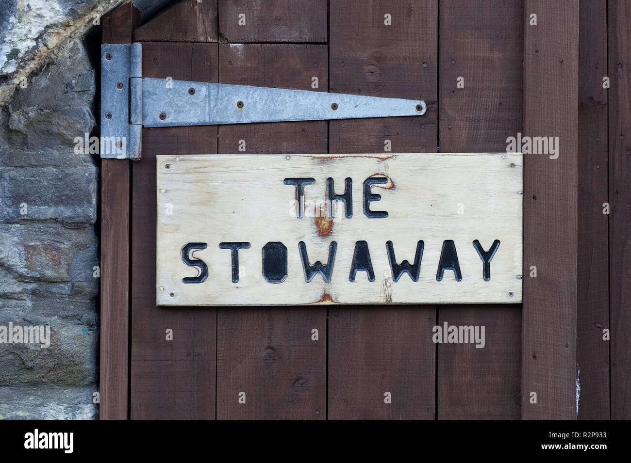 Stone building sign wooden hi-res stock photography and images - Alamy