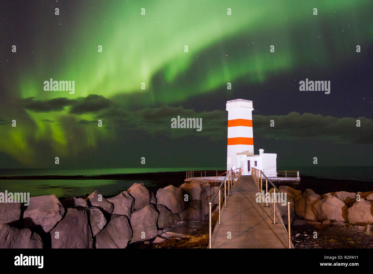 Spectacular aurora borealis above the lighthouse of Gardur, Iceland ...