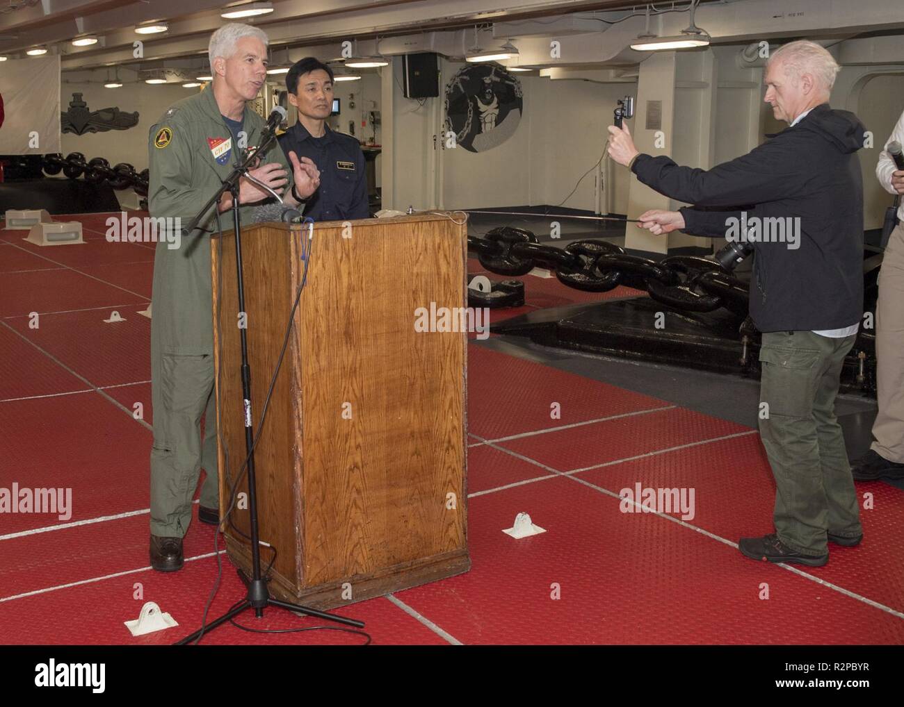 PHILIPPINE SEA (Nov. 3, 2018) Rear Adm. Karl O. Thomas, commander, task force 70, and Rear Adm ...