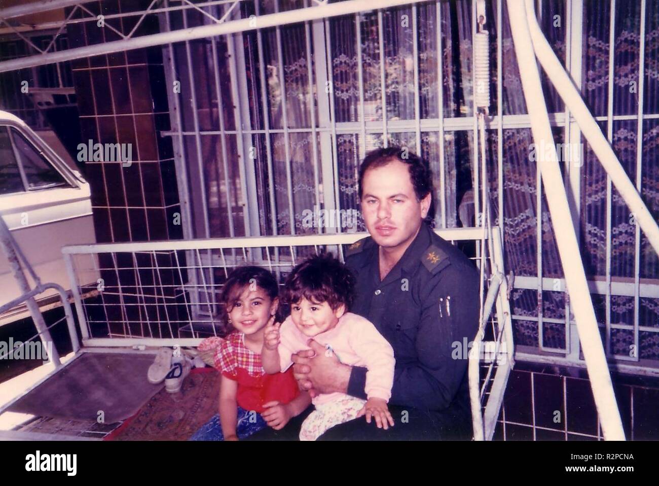 BAGHDAD, Iraq – Iraqi Army Capt. Nasir Hashim poses for a photo with ...