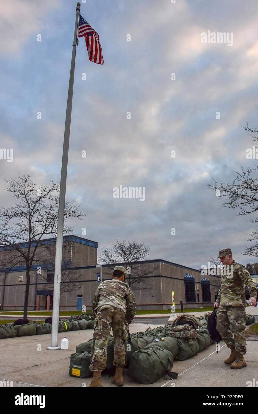 Soldiers from Michigan National Guard's 272nd RSG line their bags for ...