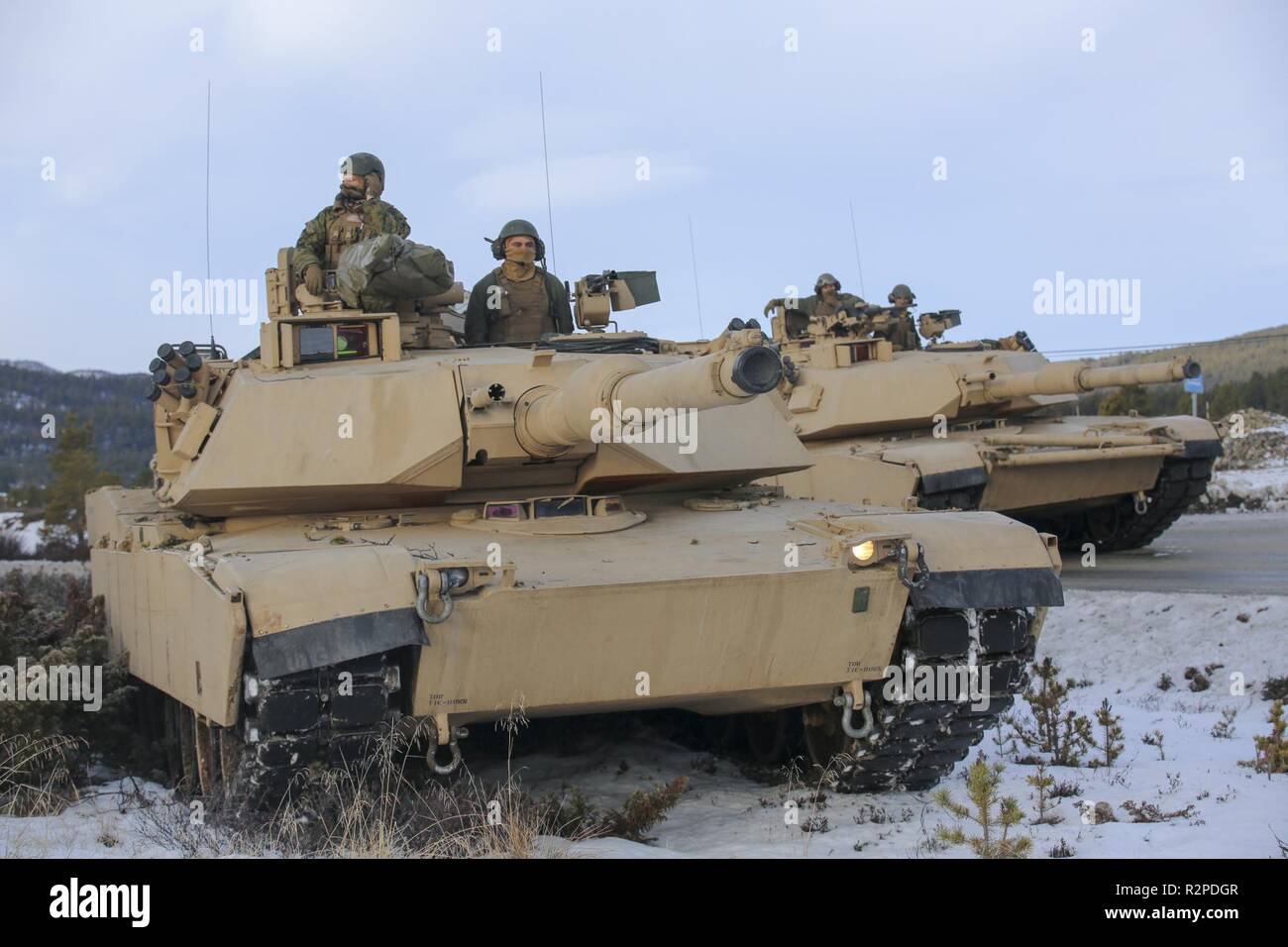 U.S. Marines with 2nd Tank Battalion, 2D Marine Division, advance on ...