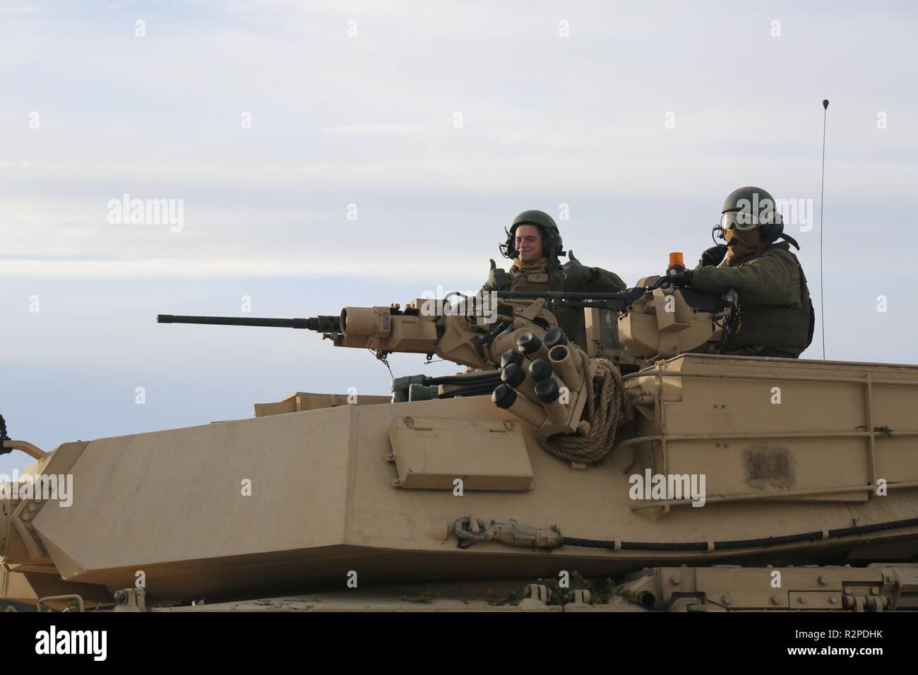 U.S. Marines with 2nd Tank Battalion, 2D Marine Division, advance on ...