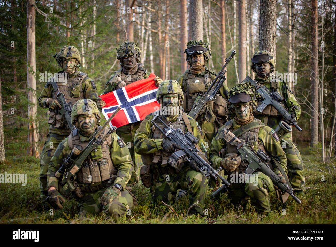 A rifle squad from 71st motorized battalion, Swedish army, are ready ...