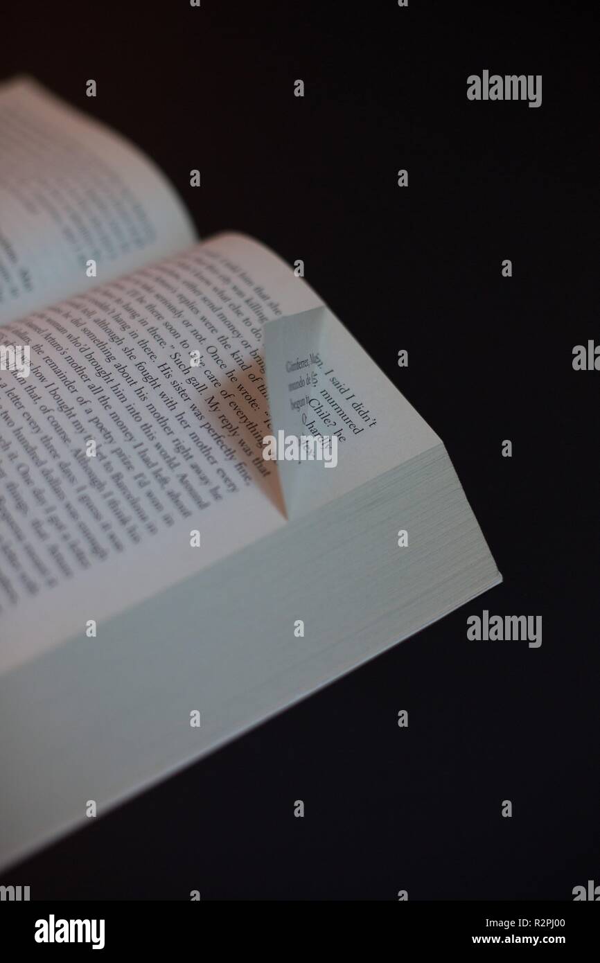 A book with a dog-eared page Stock Photo - Alamy