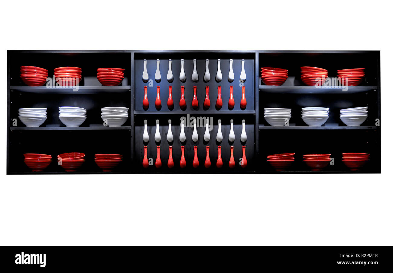 Minimalism display of Chinese soup bowls and spoons on a shelf at a ...