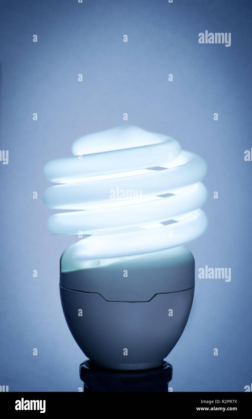 Compact fluorescent lightbulb with neon back lighting Stock Photo - Alamy