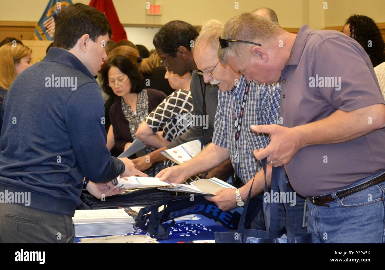 NSA Philadelphia employees talk with vendors during a health fair at ...