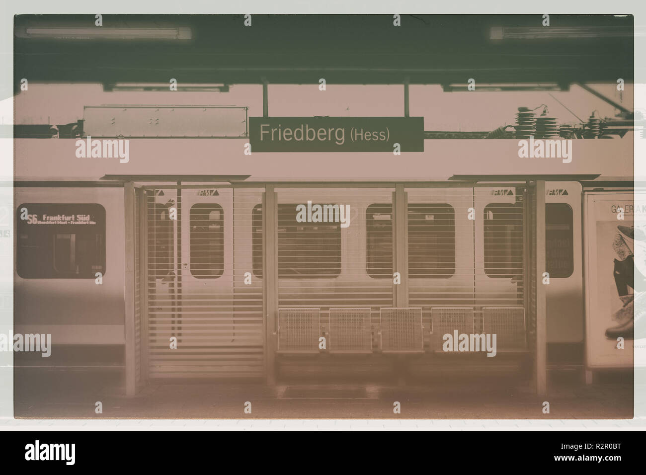 Stationary regional train of the German Federal Railway at platform of ...