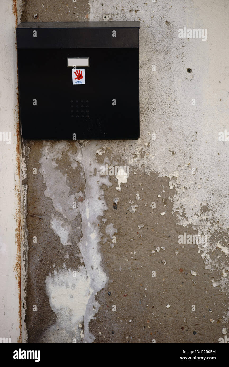 Exterior wall, paint falling off, mailbox Stock Photo - Alamy
