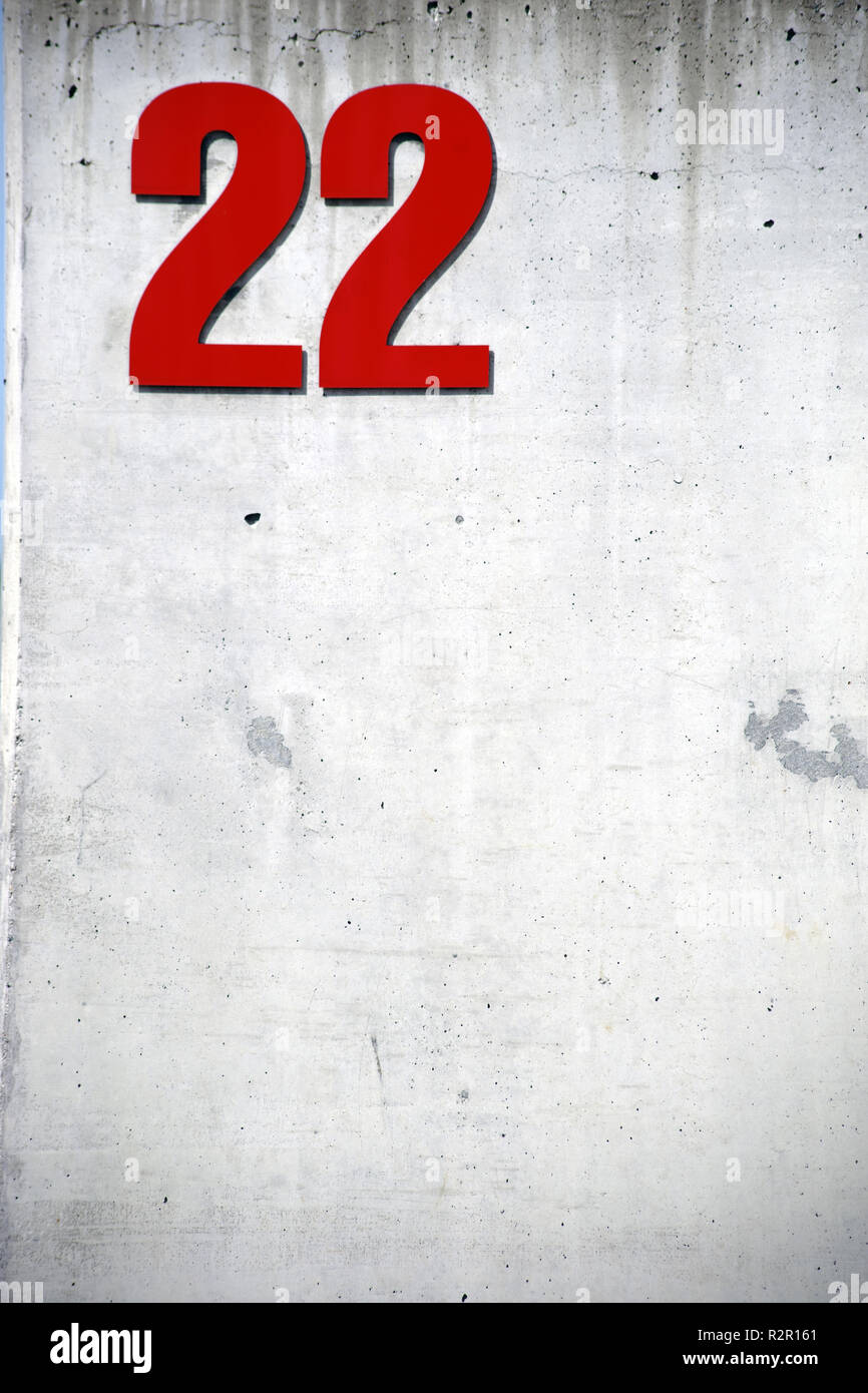 Number twenty two on a striking concrete wall hi-res stock photography ...