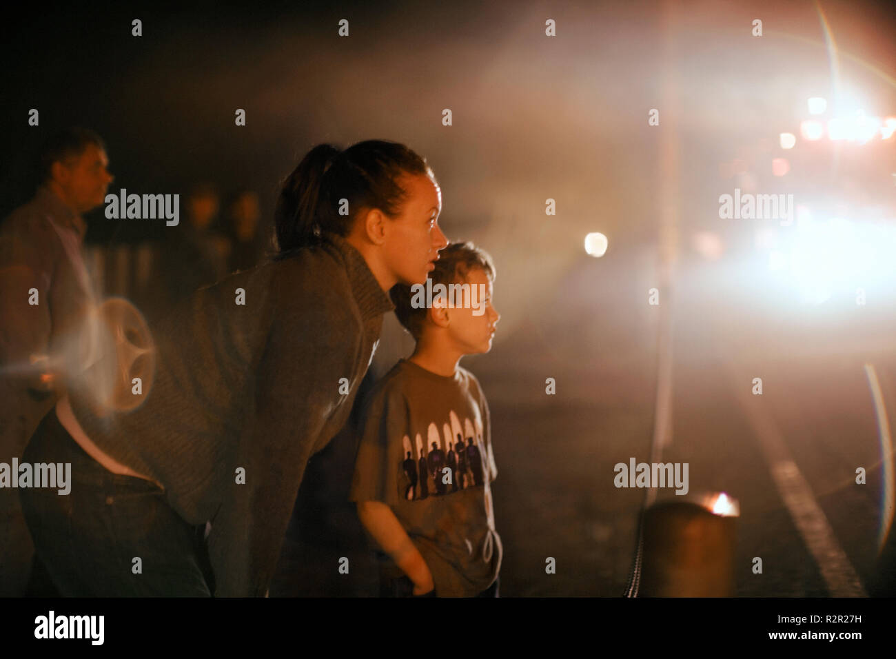 Side view of a young woman and a boy Stock Photo - Alamy