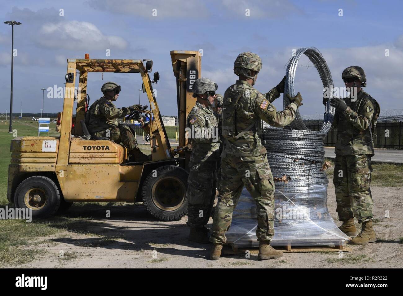 Soldiers from various Engineering Units separate packaged concertina ...