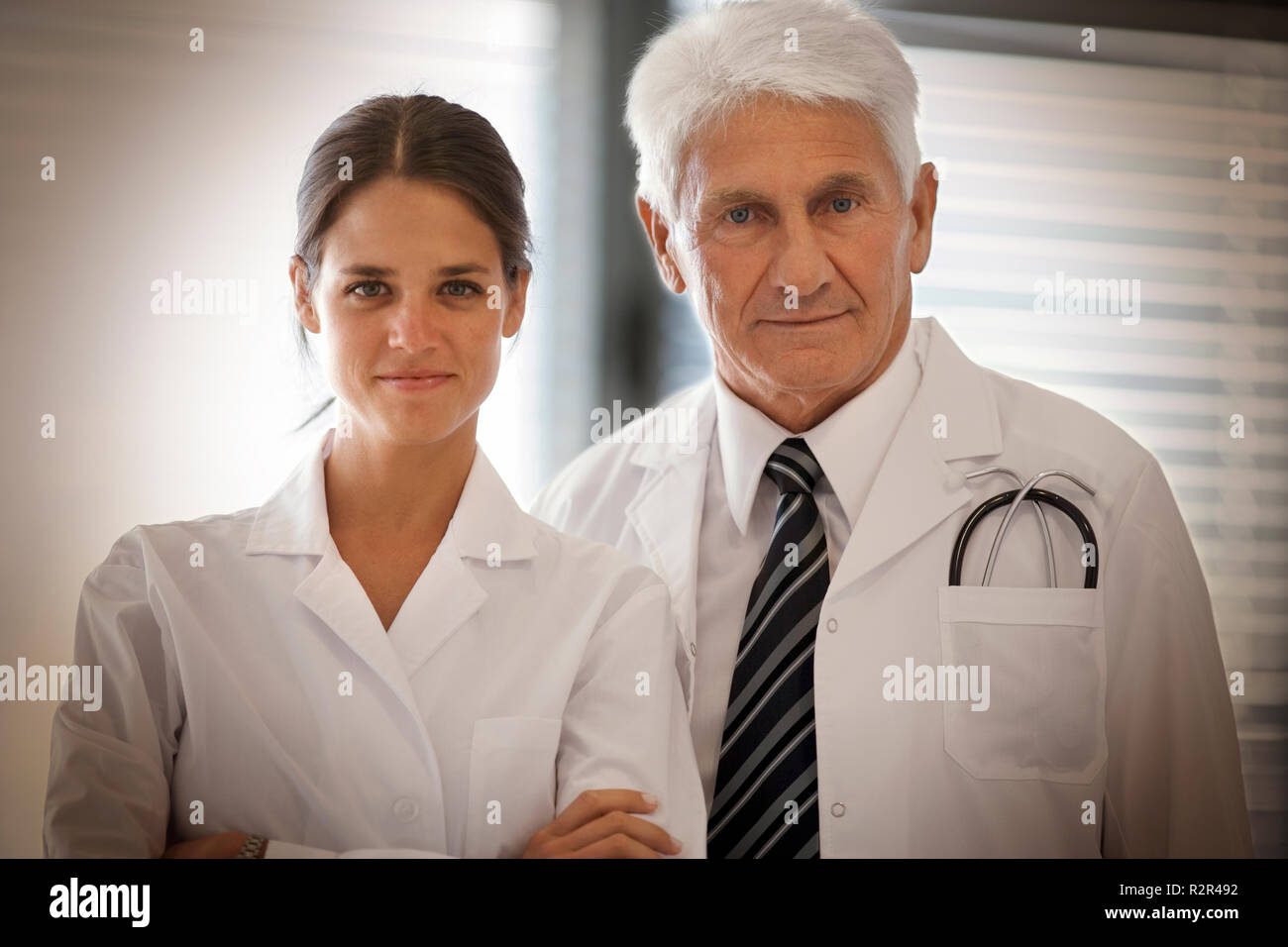 Portrait of doctors posing together Stock Photo - Alamy