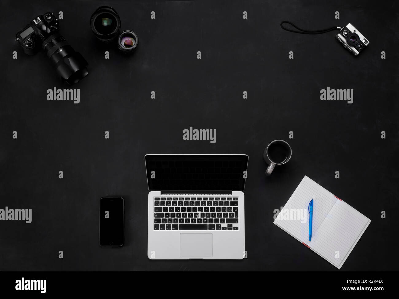 blackboard background tools photographer and computer Stock Photo - Alamy